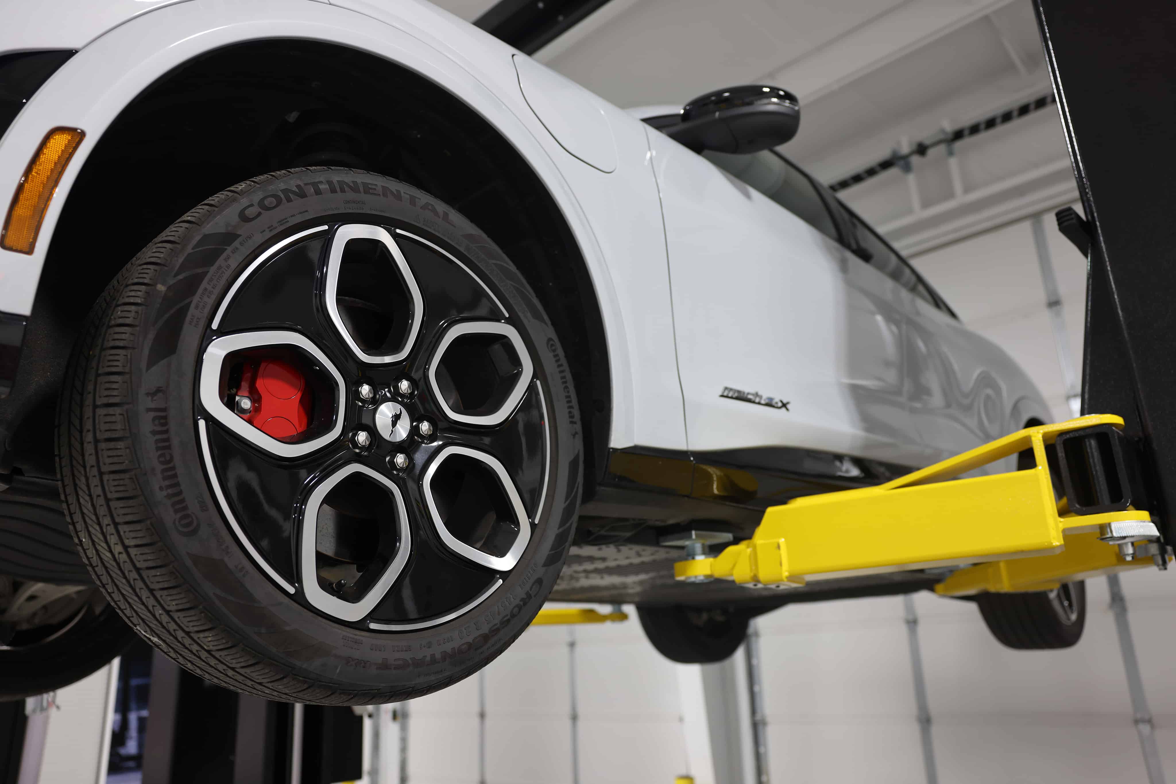 12K Heavy-Duty Two-Post Adjustable Lift - Challenger Lifts